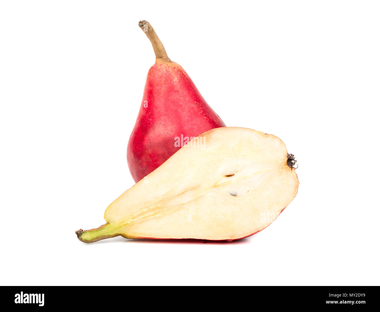 Ripe red pear with a juicy half on white background Stock Photo - Alamy