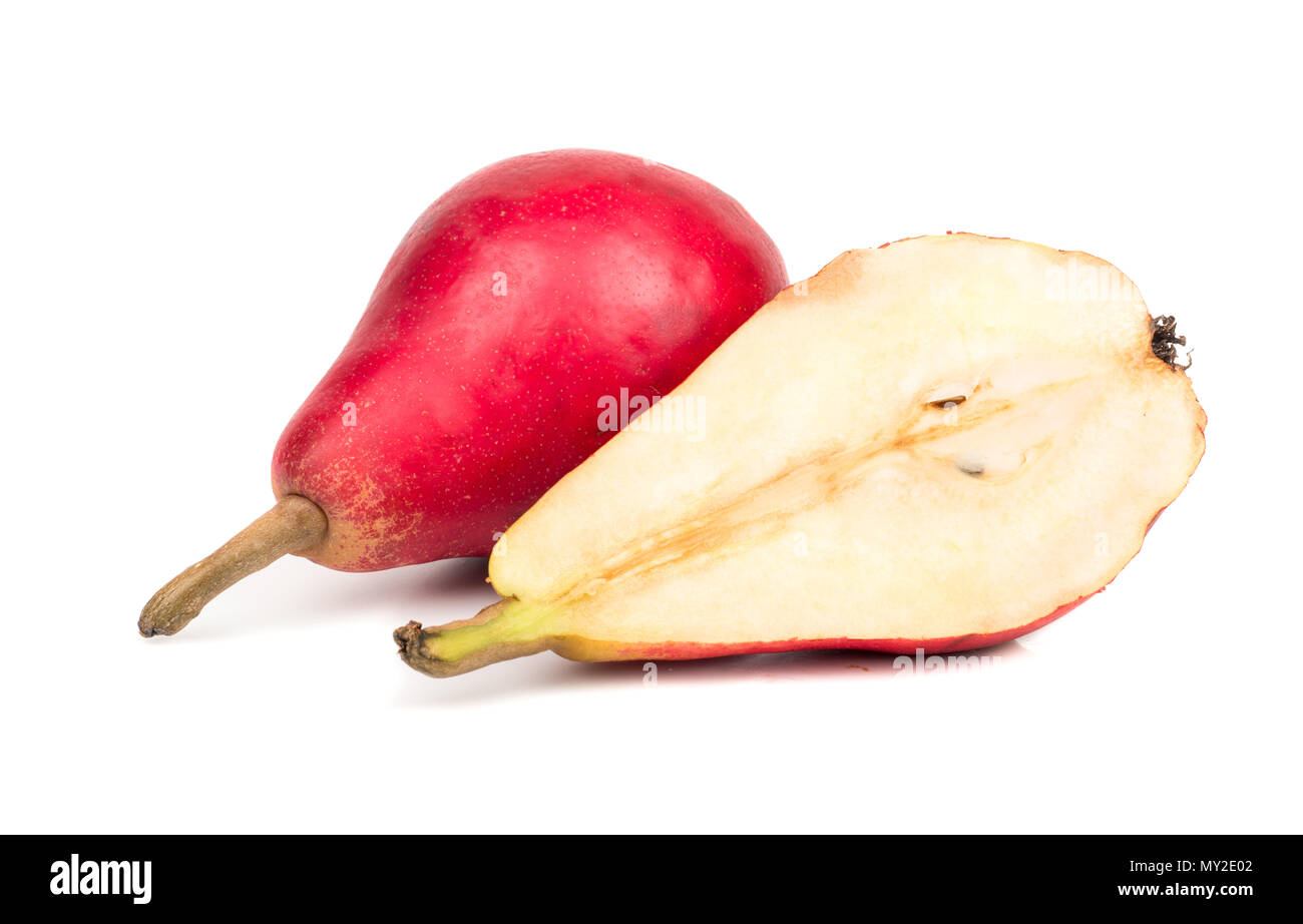 Ripe red pear with a juicy half on white background Stock Photo - Alamy