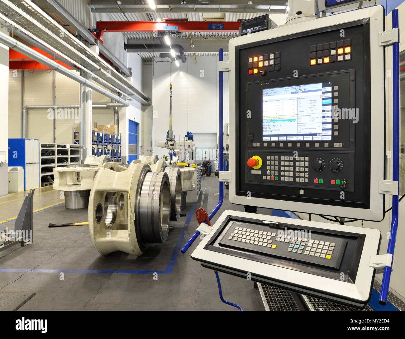 cnc machine with panel and keyboard in a Factory of modern mechanical ...