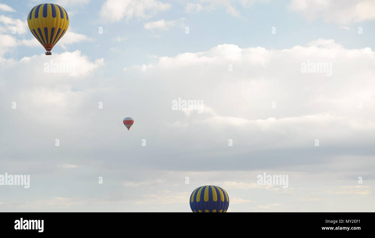 Three hot air balloons flying in the sky Stock Photo - Alamy