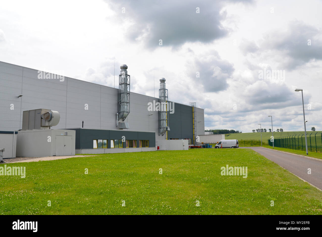 commercial building exterior view of a mechanical engineering factory ...
