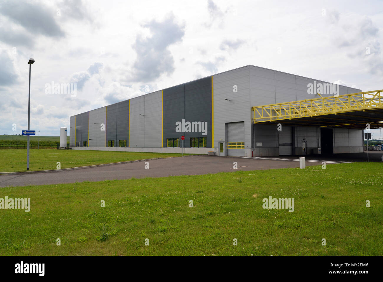 commercial building exterior view of a mechanical engineering factory ...