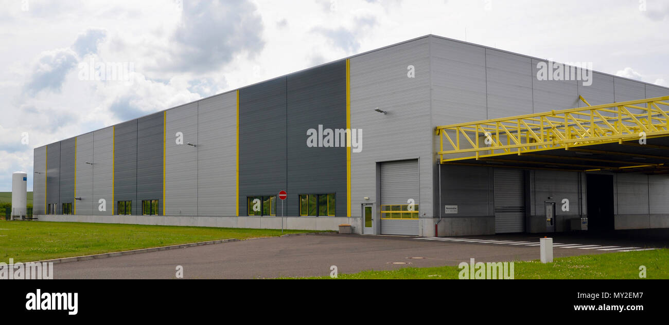 commercial building exterior view of a mechanical engineering factory ...