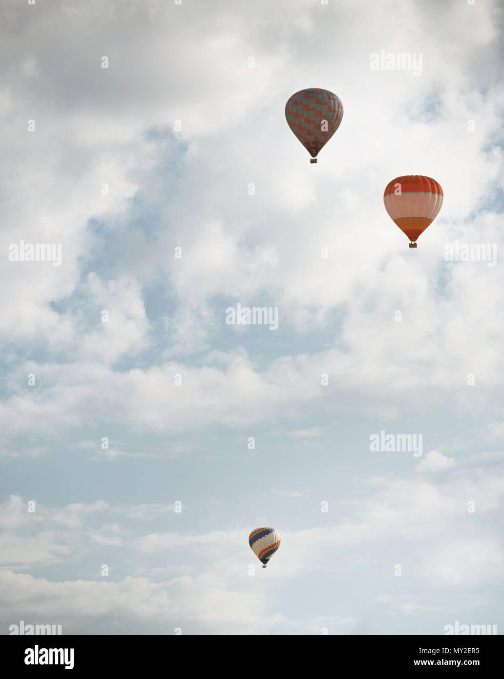 Three hot air balloons flying in the sky Stock Photo - Alamy