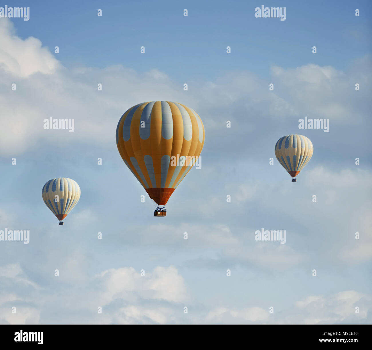 Three hot air balloons flying in the sky Stock Photo - Alamy