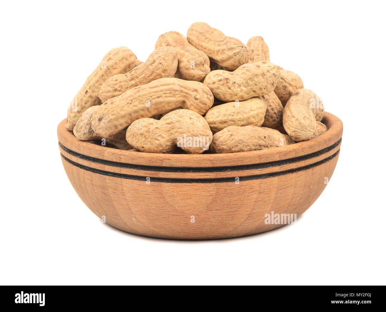 Peanuts in the shell and a wooden bowl isolated on white background ...
