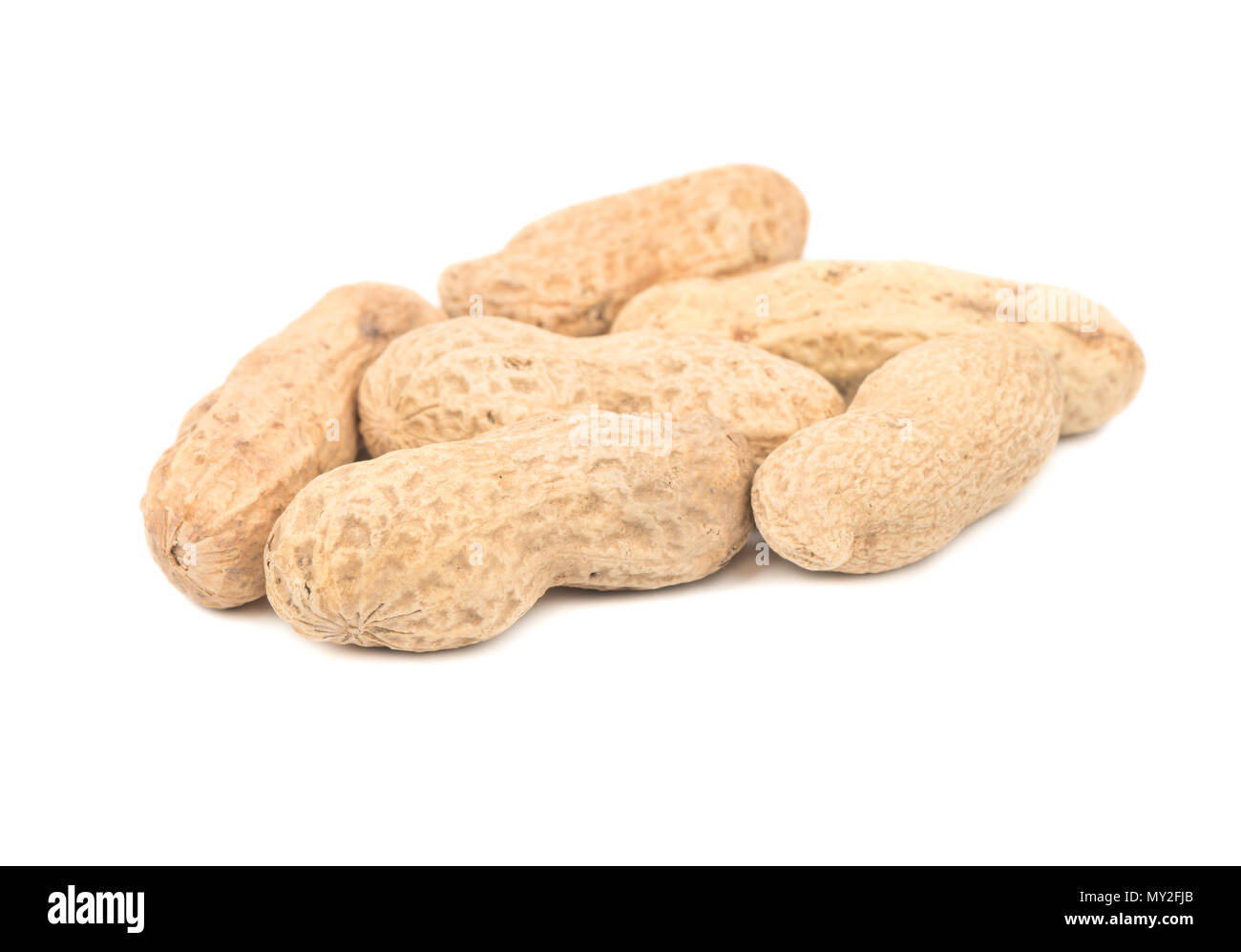 Several peanuts in shell on a white background Stock Photo - Alamy