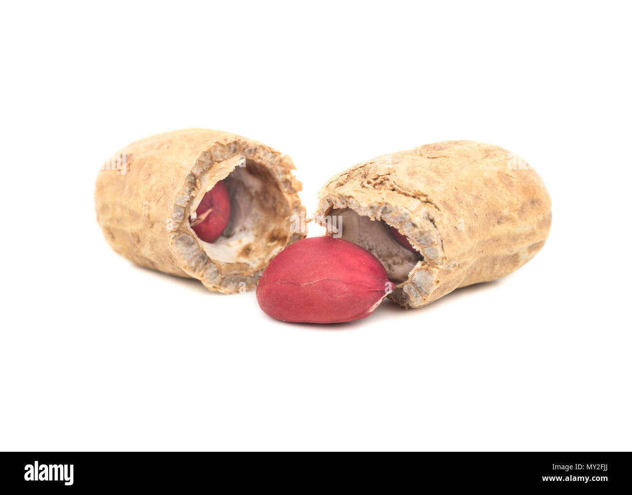 Broken peanuts in shell on white background Stock Photo - Alamy