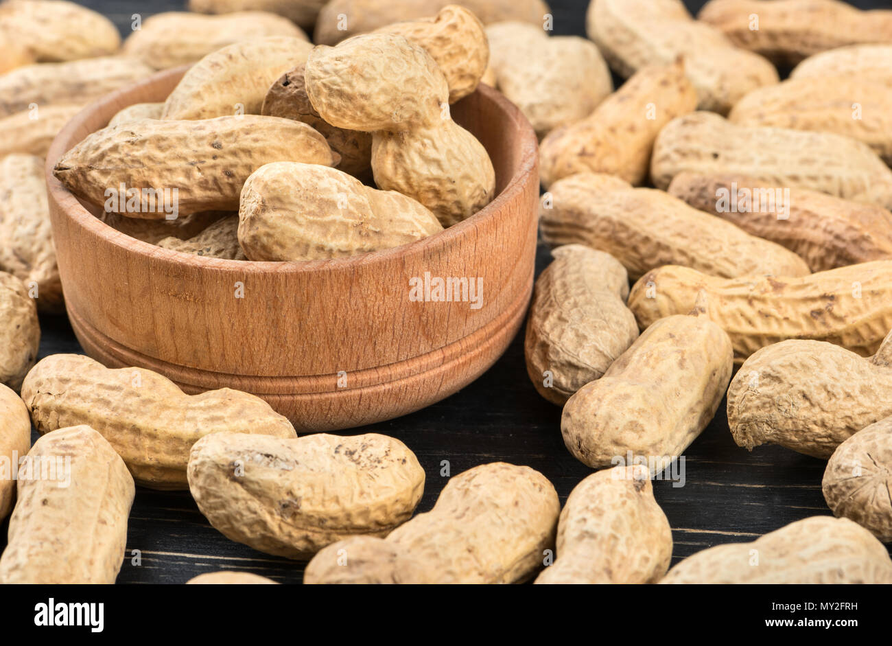 Peanuts in shell scattered hi-res stock photography and images - Alamy