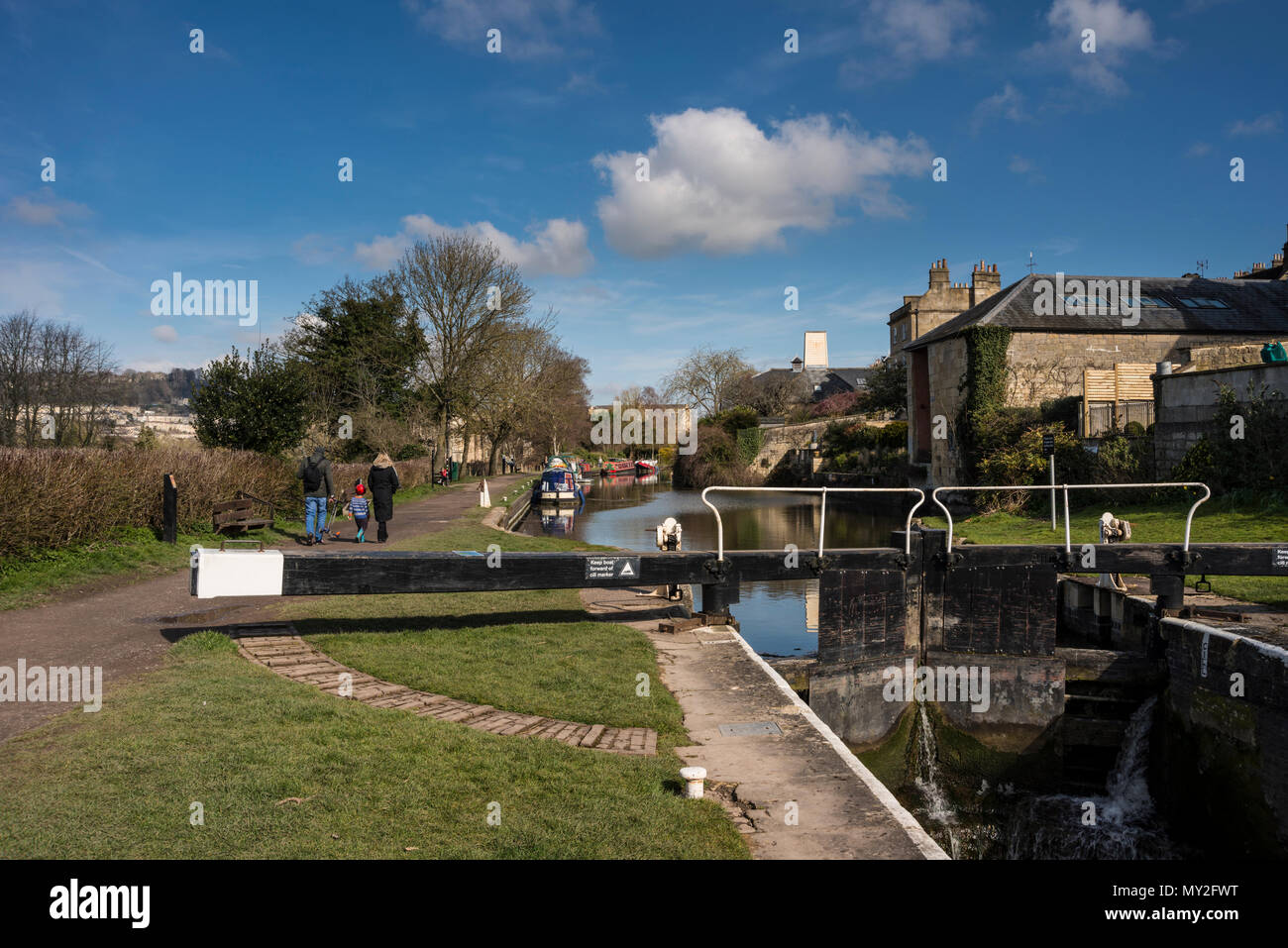 People walking along Kennet and Avon Canal on sunny day, Bathwick, Bath ...