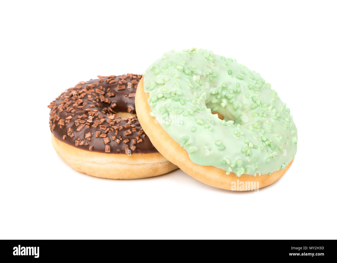 Two donut with chocolate icing and green isolated on white background ...