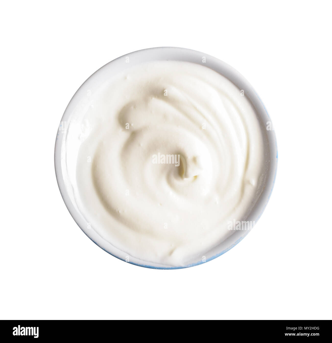Greek yogurt in bowl isolated on white background, top view Stock Photo ...
