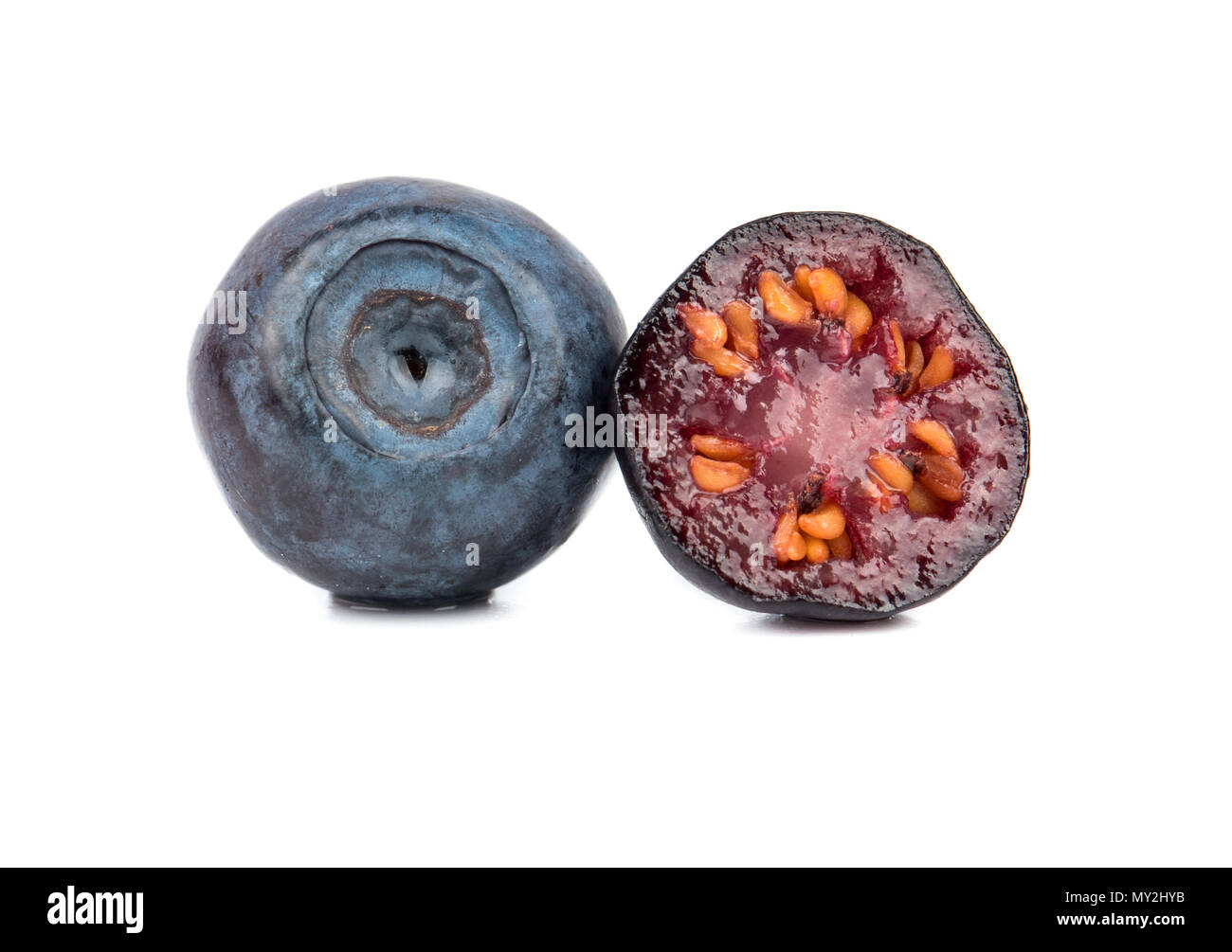 Fresh juicy blueberries with half isolated on white background Stock ...
