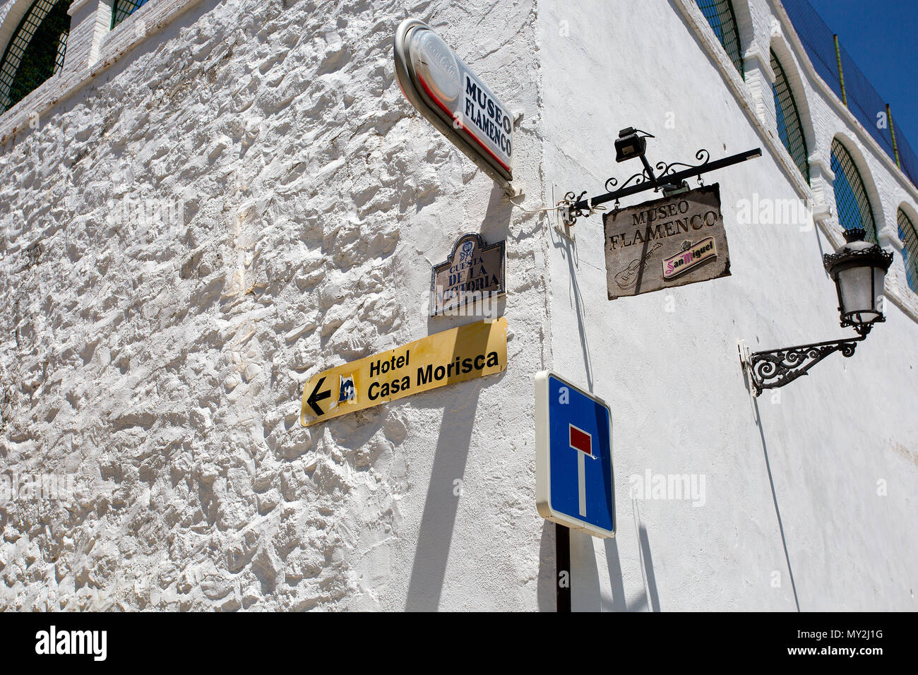 Street signs on an alleyway in Granada, Andalucia, Spain Stock Photo ...