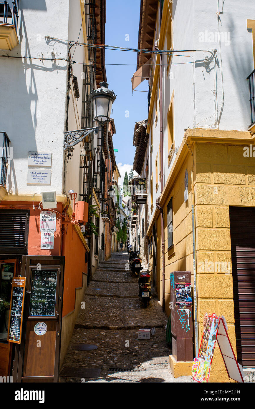 Street signs on an alleyway in Granada, Andalucia, Spain Stock Photo ...