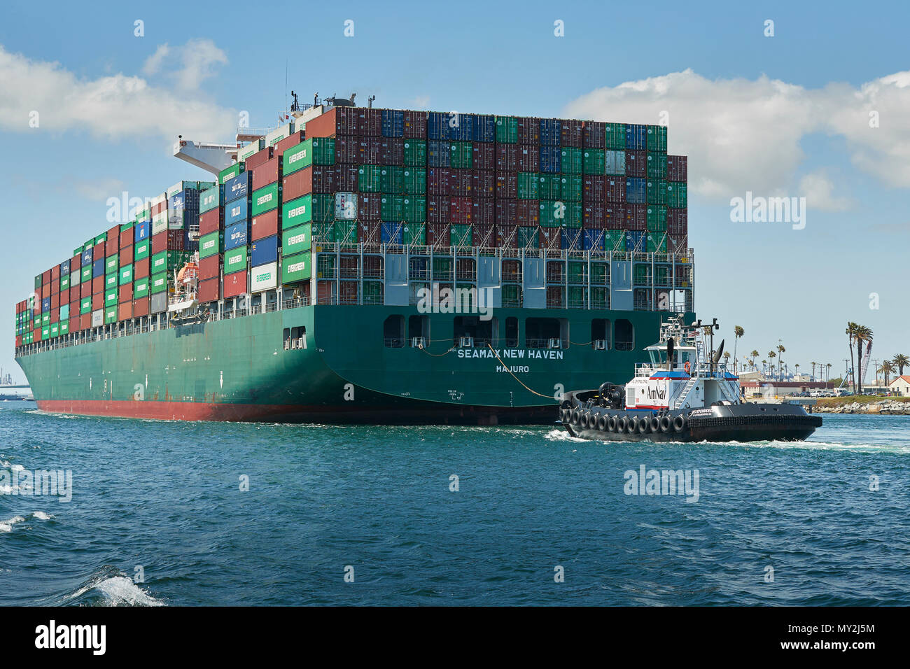 The Container Ship, SEAMAX NEW HAVEN, Guided By Tugs, Enters The Los ...