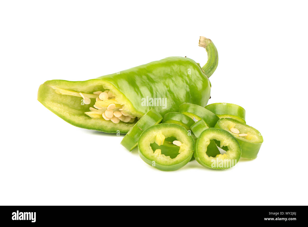 Half chili green pepper slices on a white background Stock Photo - Alamy