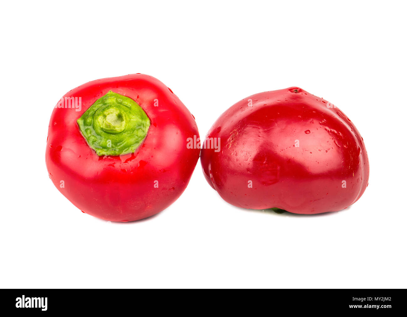 Two small red pepper isolated on white background Stock Photo - Alamy