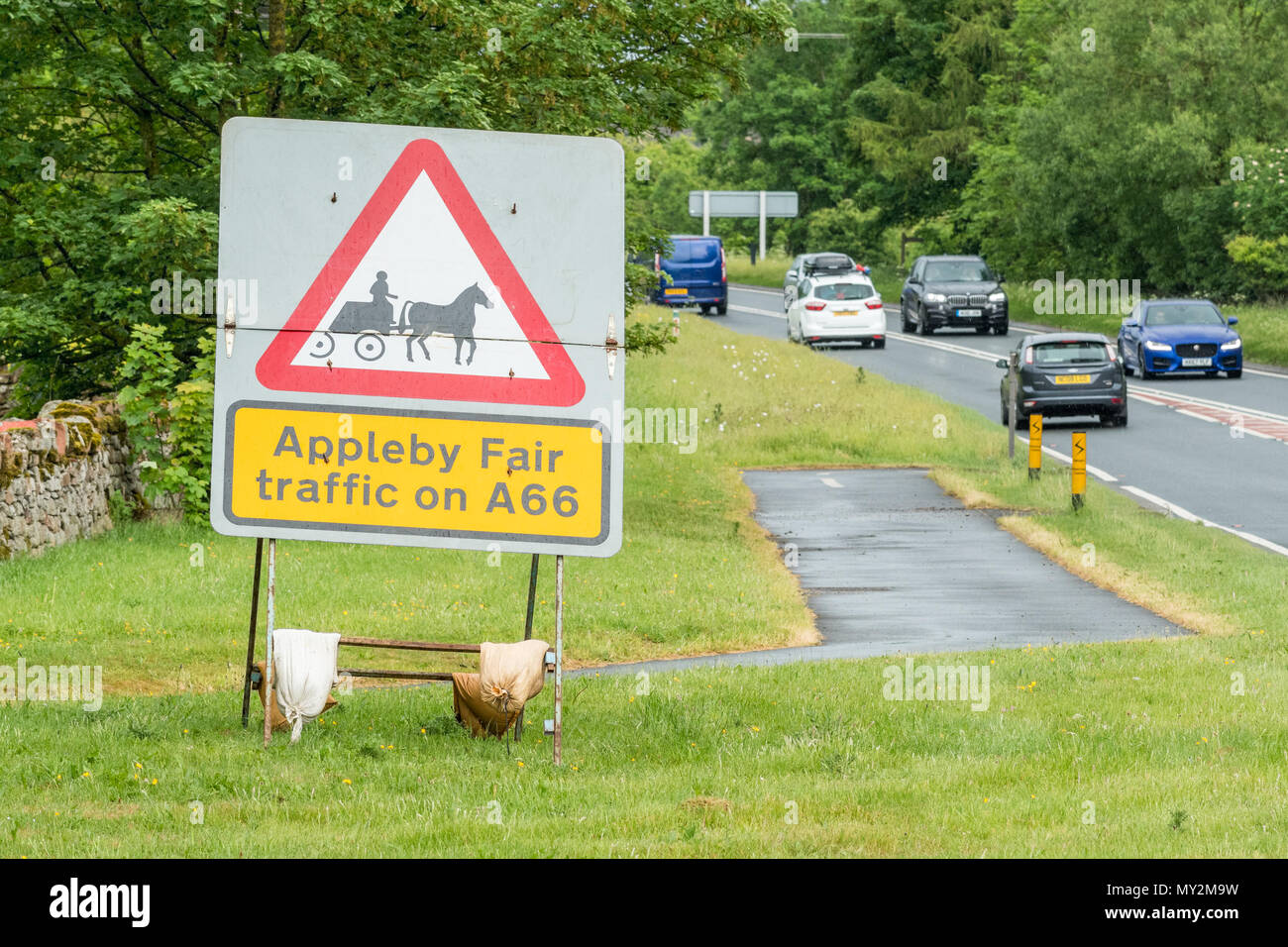 Appleby Fair traffic on A66 road traffic sign Stock Photo - Alamy