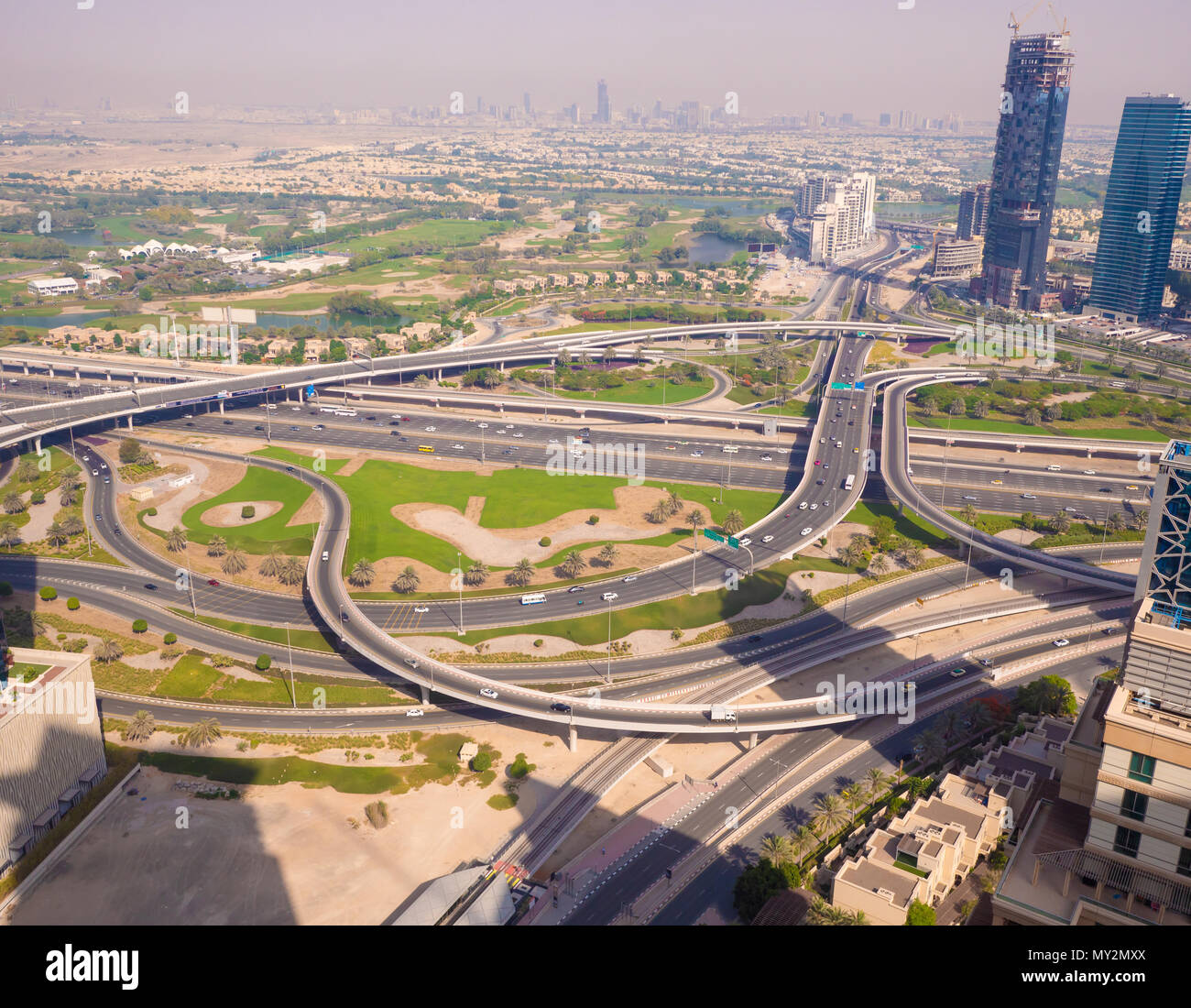 Amazing view of the junction roads from above in Dubai. Traffic on the ...