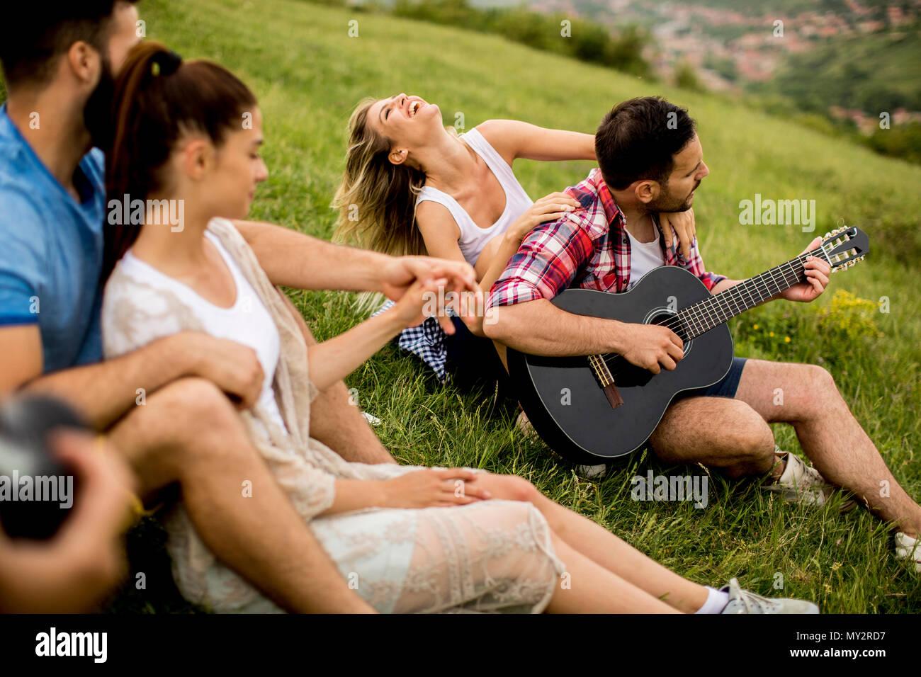 Group od young people having fun on a trip in nature on mountain Stock ...