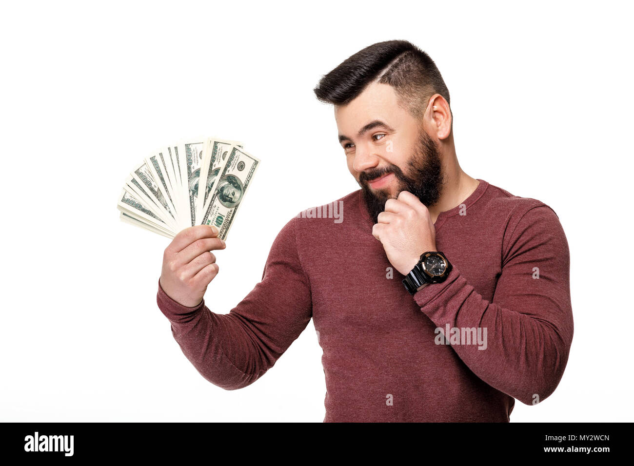 Young man money saving Cut Out Stock Images & Pictures - Alamy