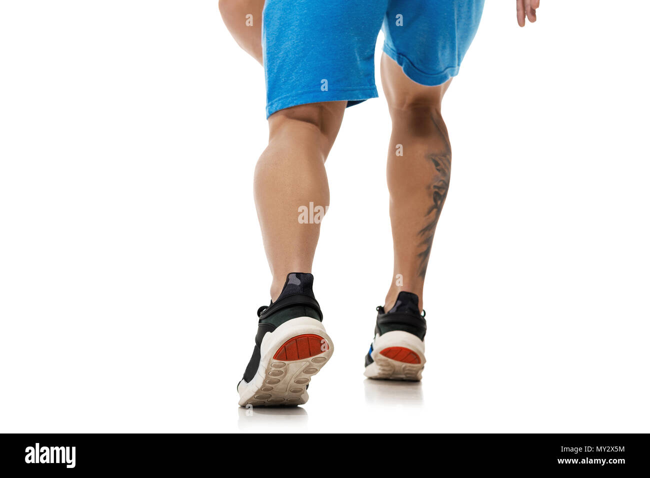 legs of man running on white background Stock Photo - Alamy