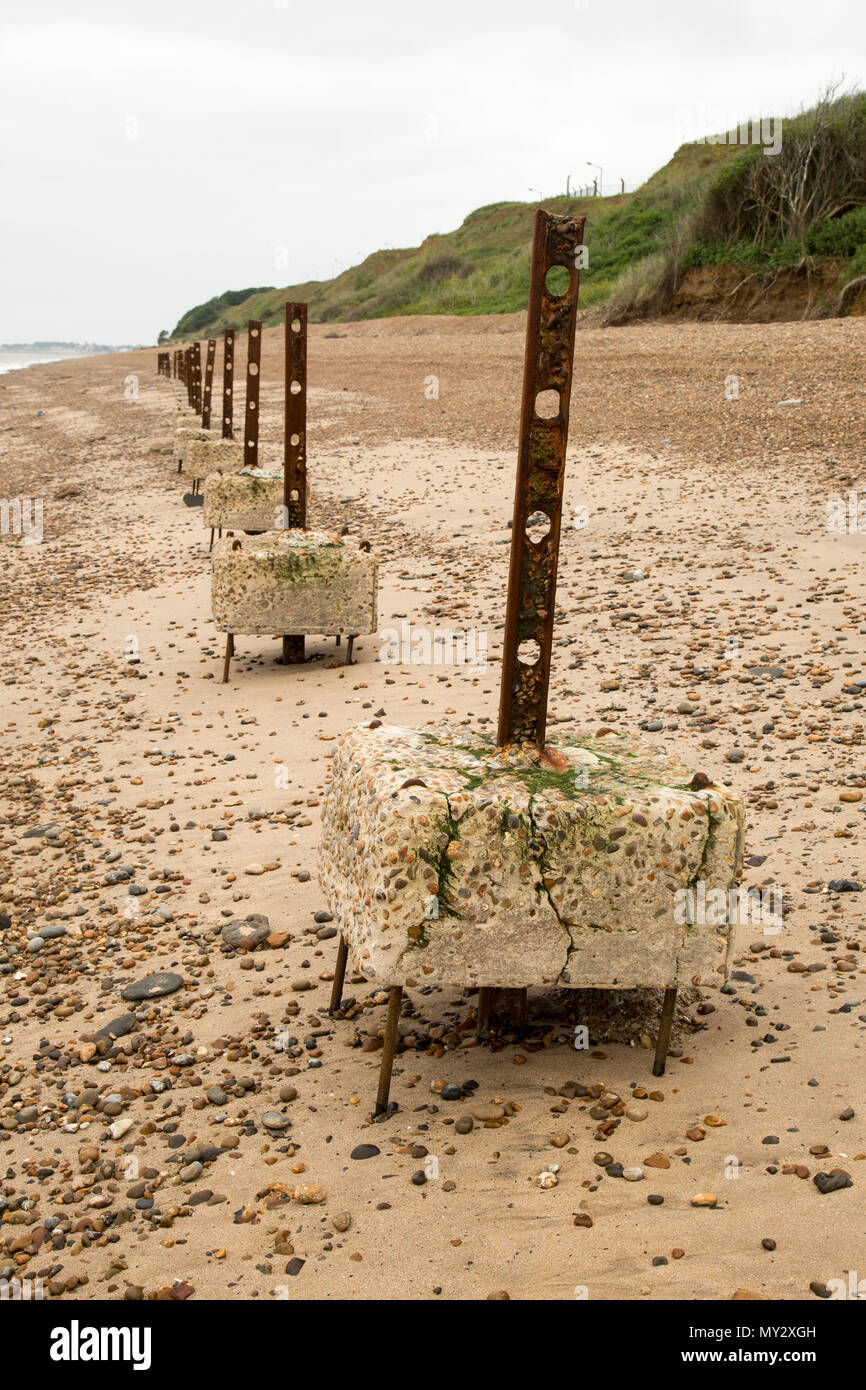 Remains of steel stanchions for barbed wire anti-invasion defences on ...