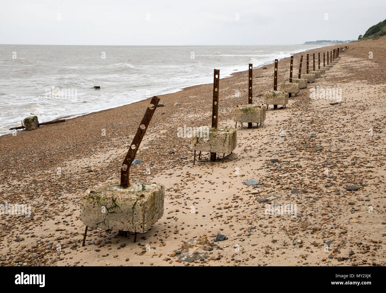 Remains of steel stanchions for barbed wire anti-invasion defences on ...