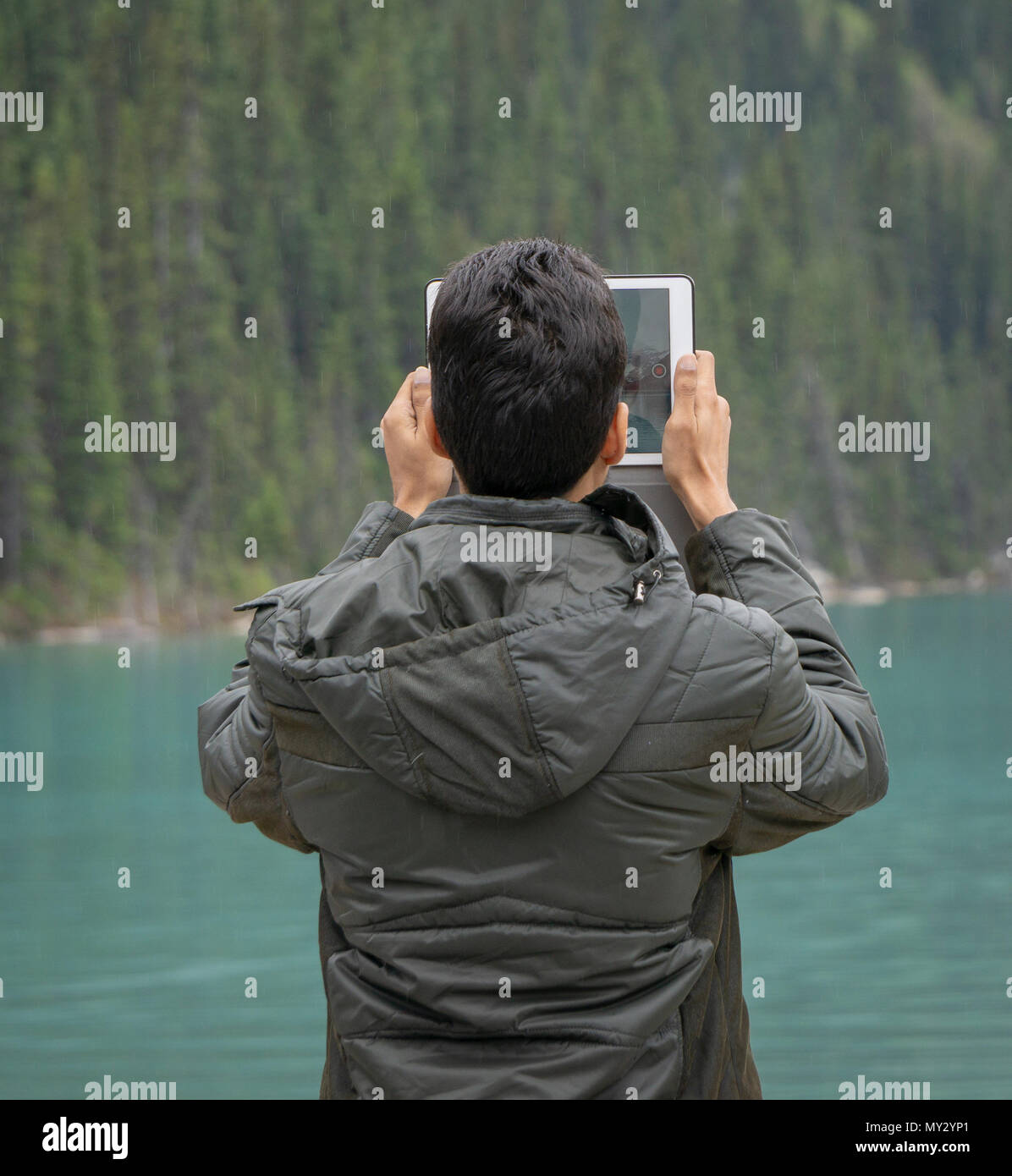 Man has iPad Stock Photo - Alamy
