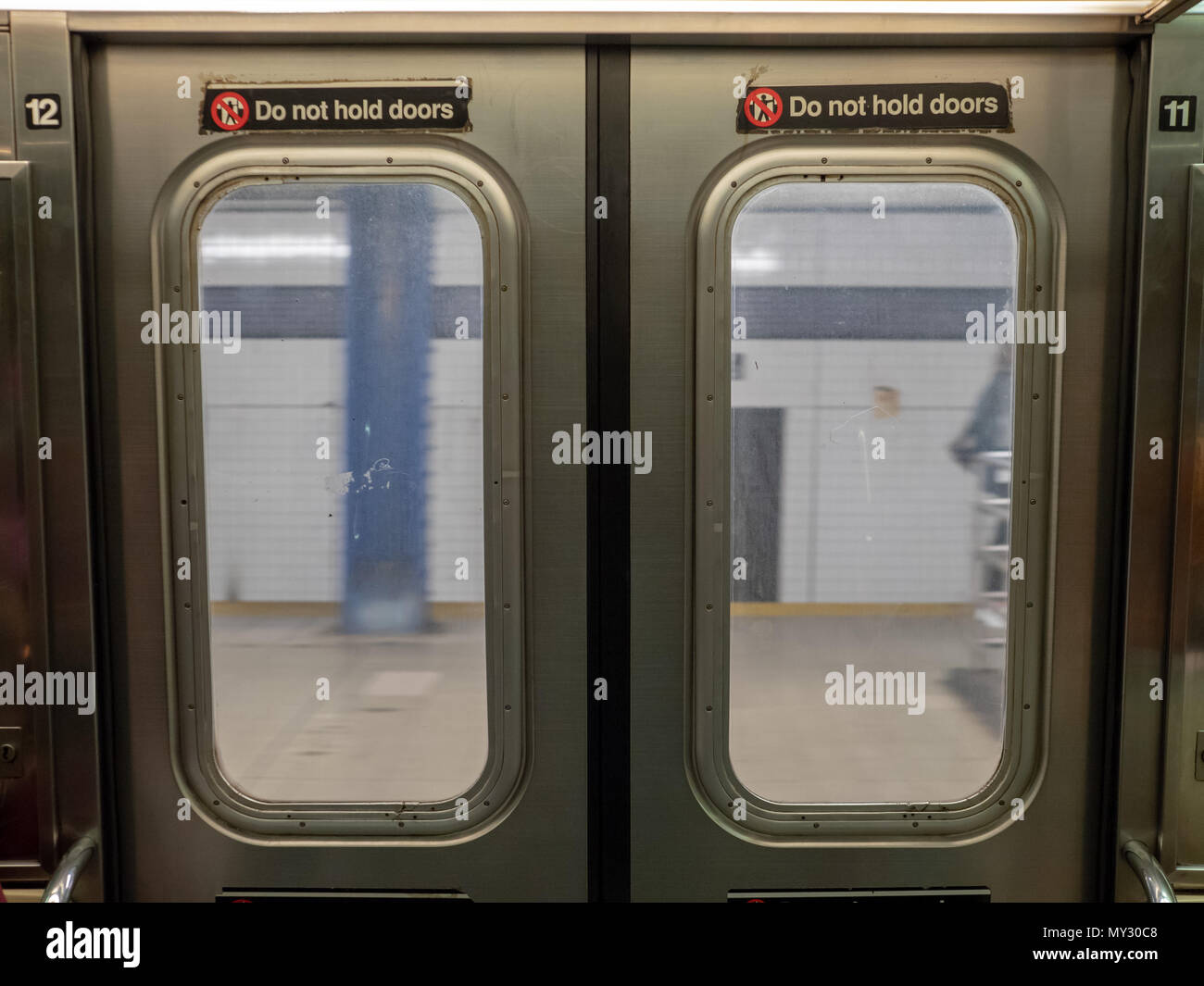 People looking out train door hi-res stock photography and images - Alamy