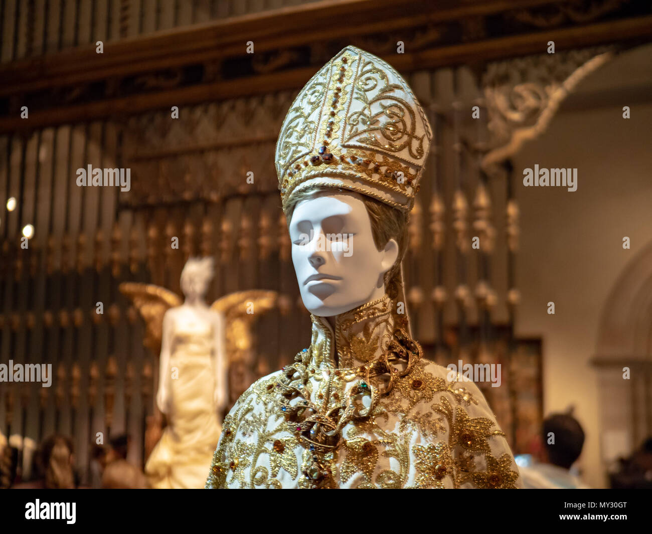 A mannequin wearing a cloak and headdress, showcasing fine 21st century ...