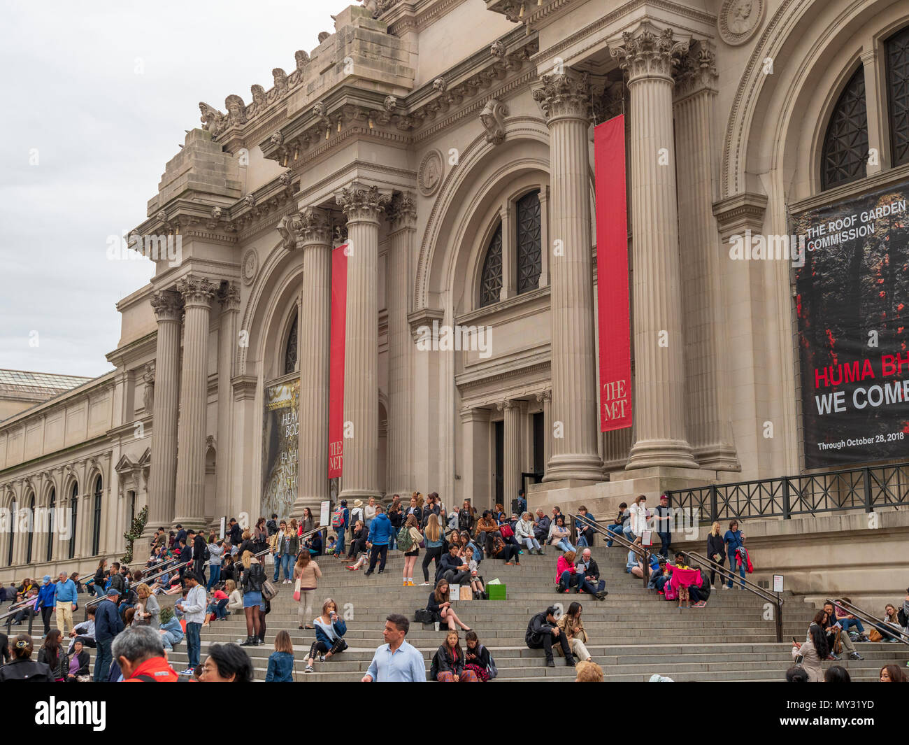 NEW YORK, NY – MAY 18, 2018: Museum goers and tourists rest outside on ...