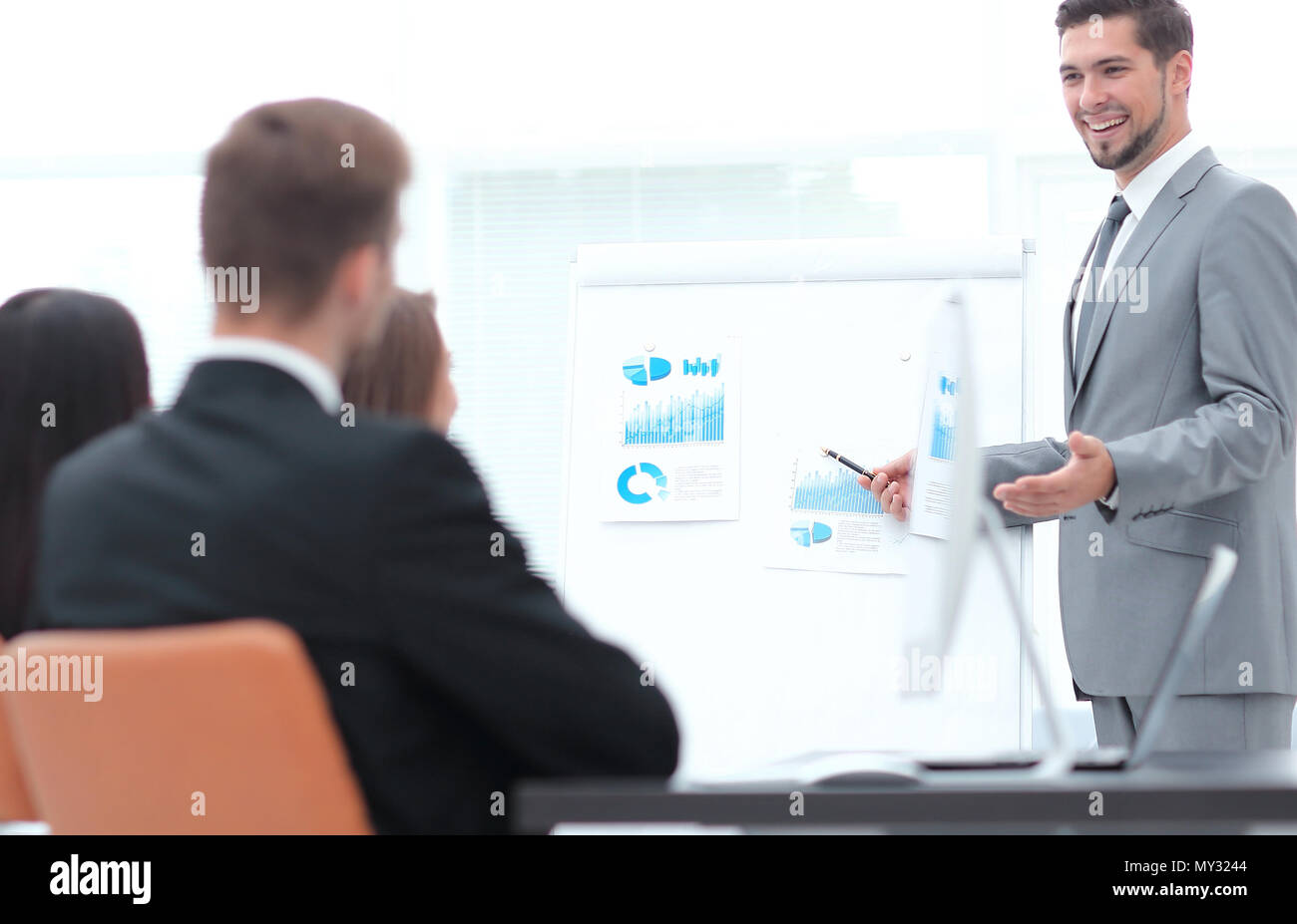 Business man making a presentation in the office Stock Photo - Alamy