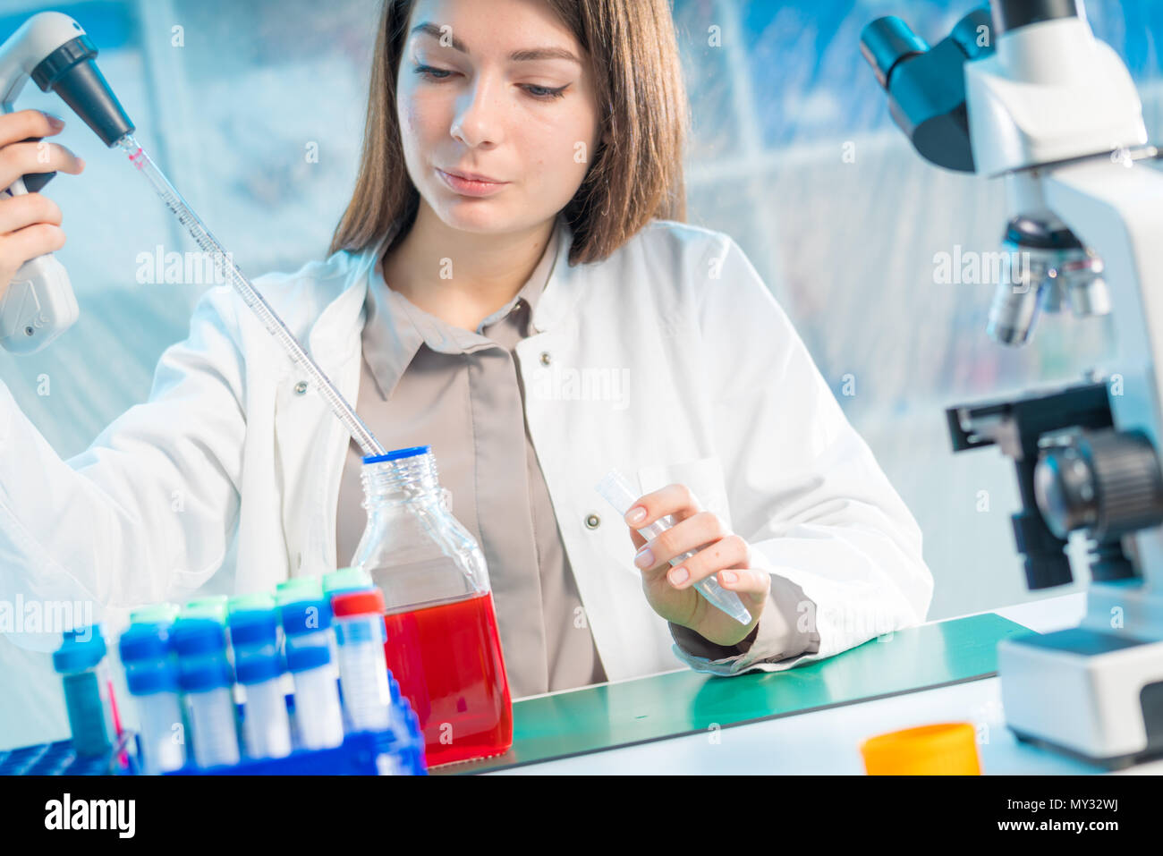 Chemical laboratory scientist woman working with pipette Stock Photo ...
