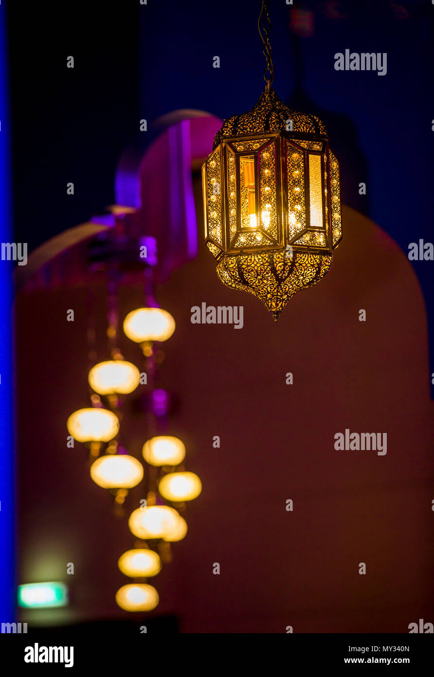 Lantern and lights dangling Stock Photo - Alamy