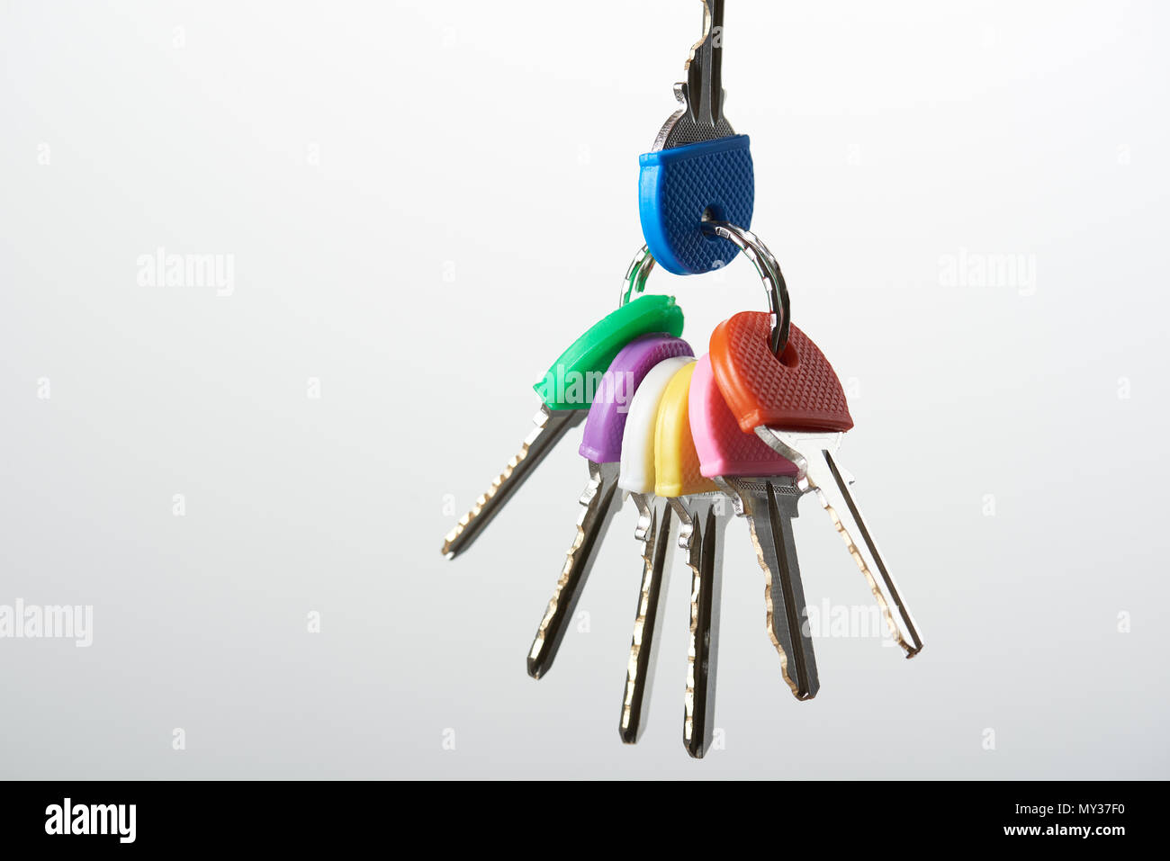 Set of colorful keys on ring isolated on white background Stock Photo ...