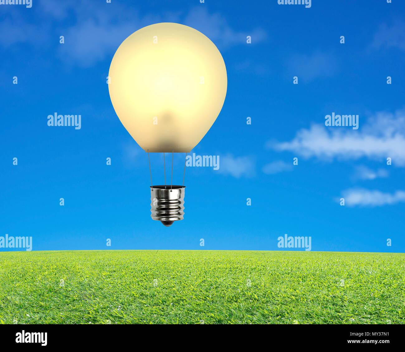 Single glowing lamp balloon flying over green meadow with cloud and ...
