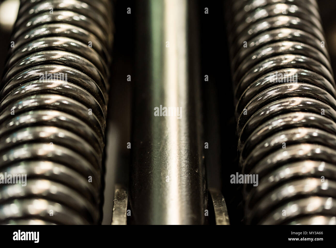 Closeup of shiny galvanized coiled helical springs Stock Photo - Alamy