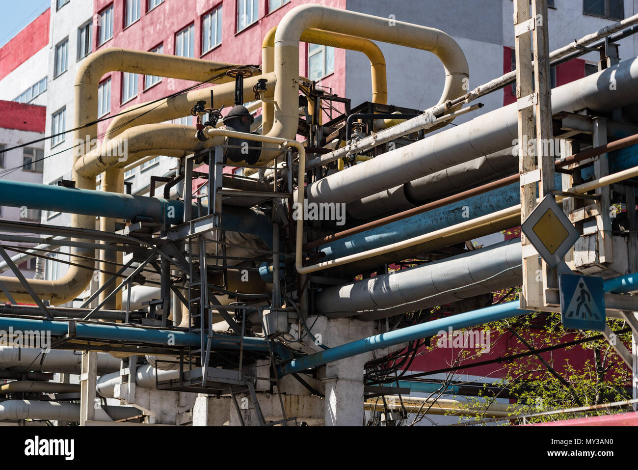 Industrial pipes outside building Stock Photo - Alamy