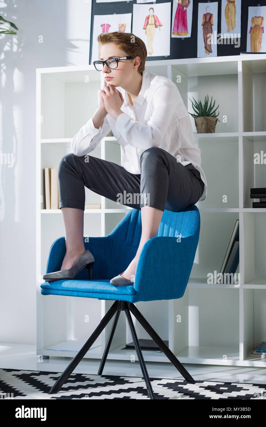 Fashion designer sitting chair hi-res stock photography and images - Alamy