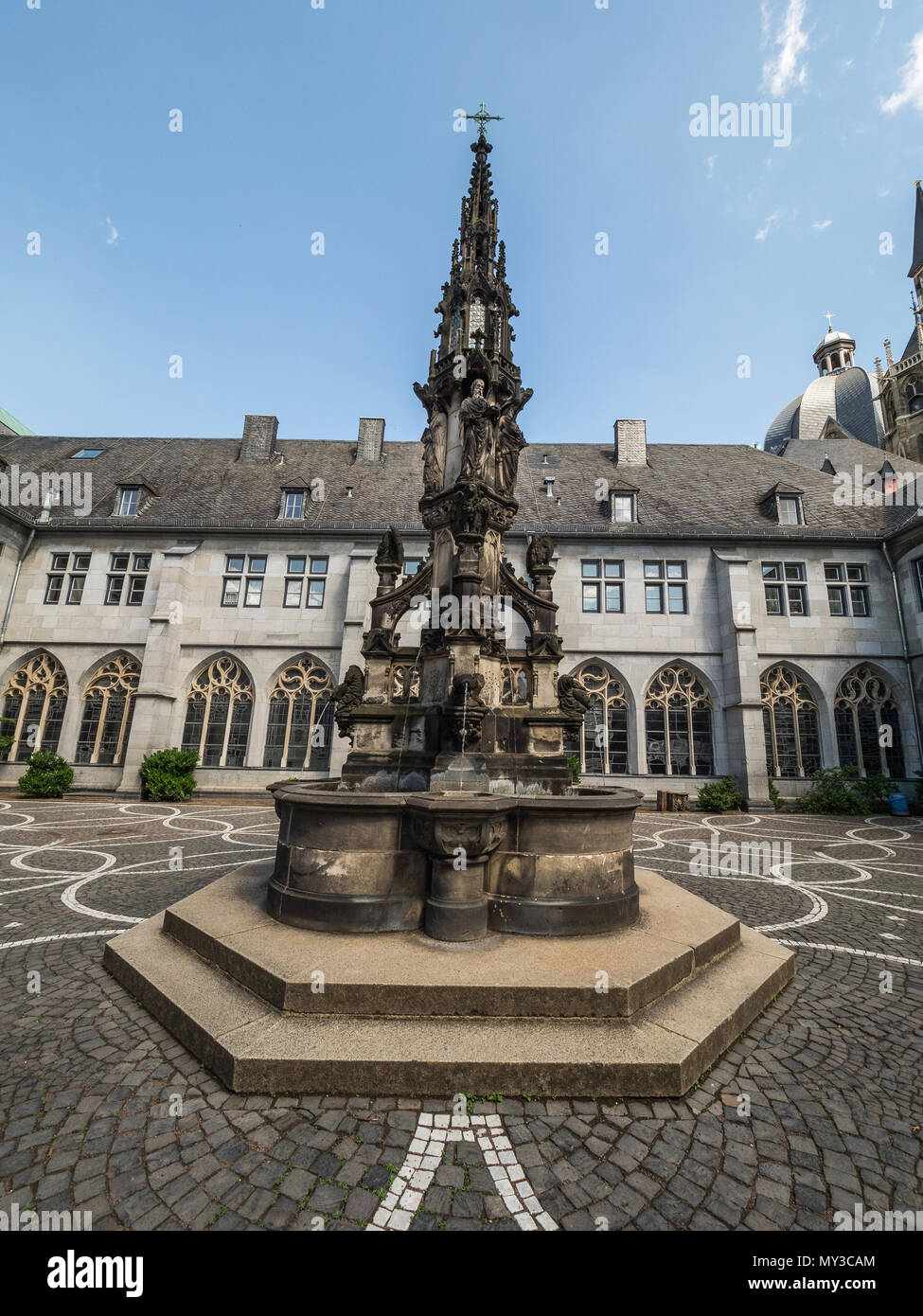 AACHEN, GERMANY - MAY 31, 2018. Courtyard and fountain in ...