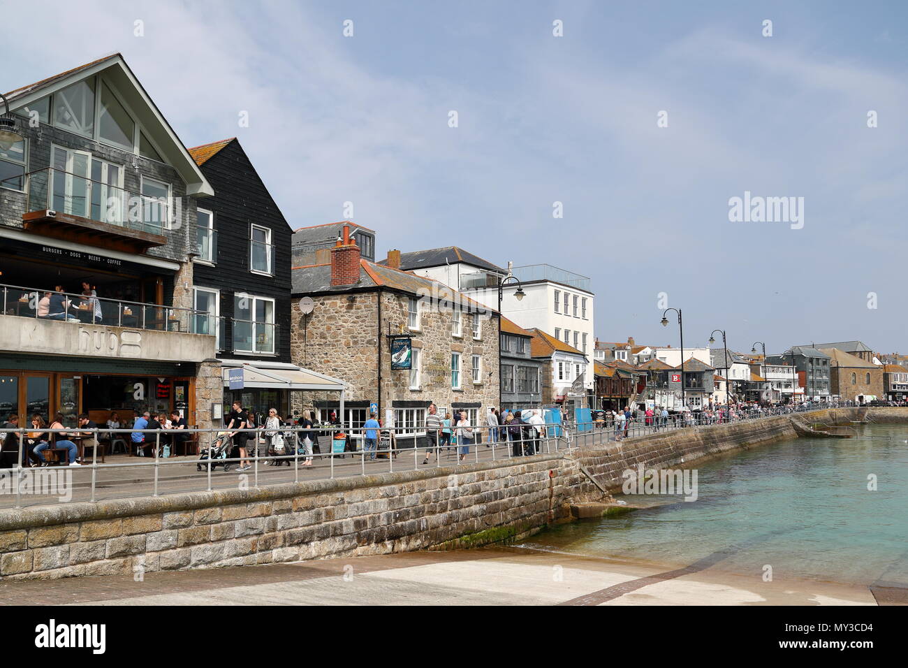 The waterfront at St Ives Harbour is a popular tourist destination, St ...