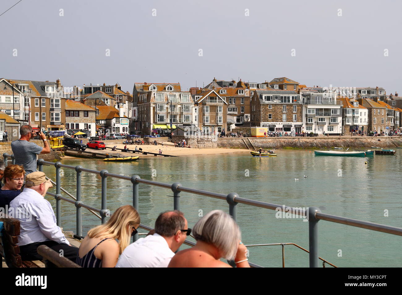 The waterfront at St Ives Harbour is a popular tourist destination, St ...