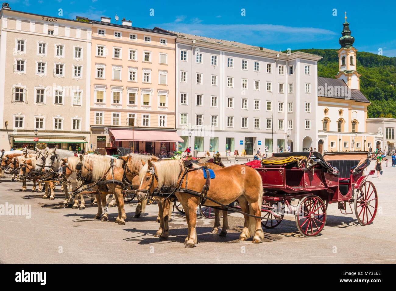 Salzburg, Austria - May 22, 2017: Horse drawn carriages lined up ready ...