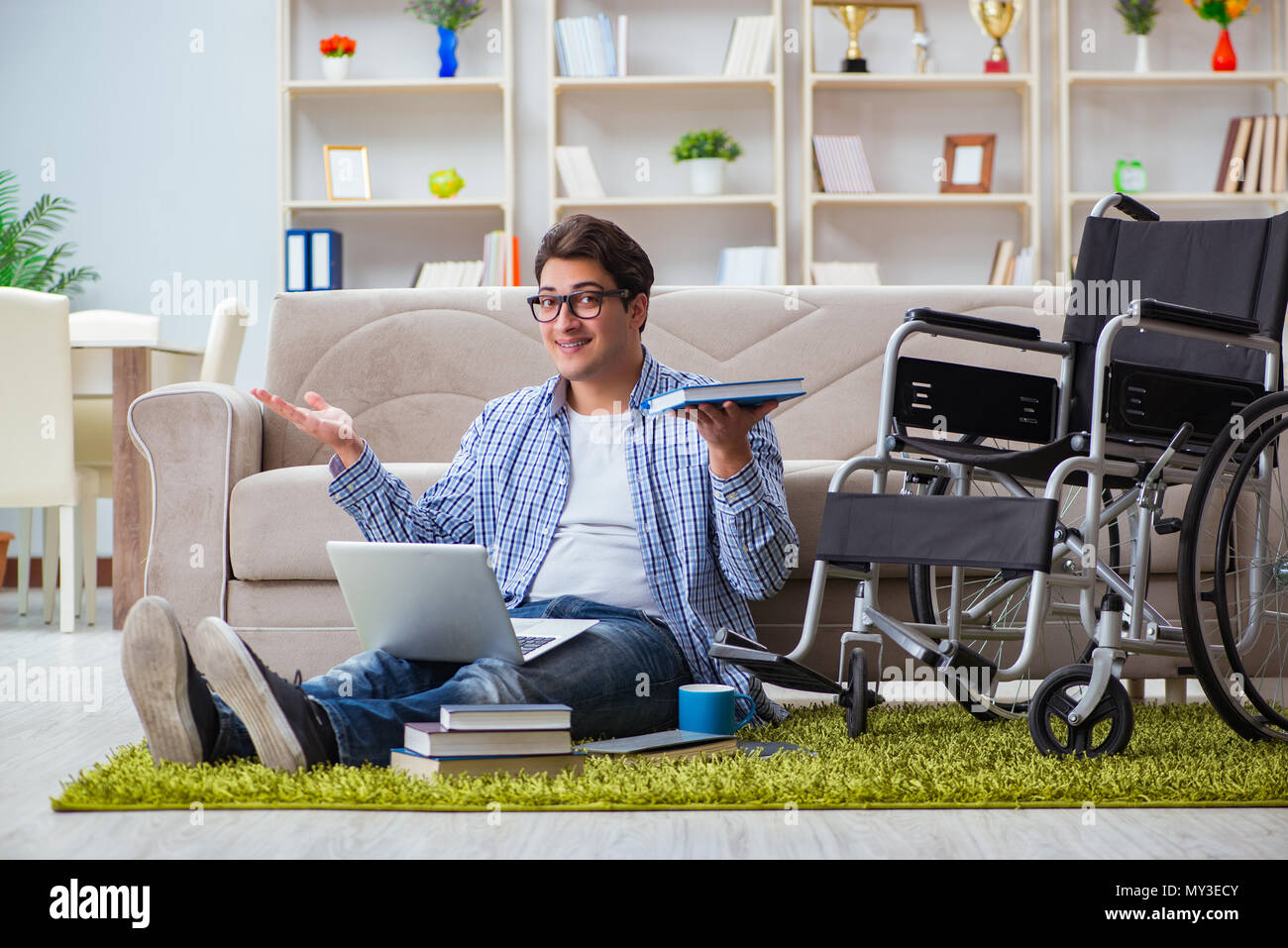 Young student studying at home Stock Photo - Alamy