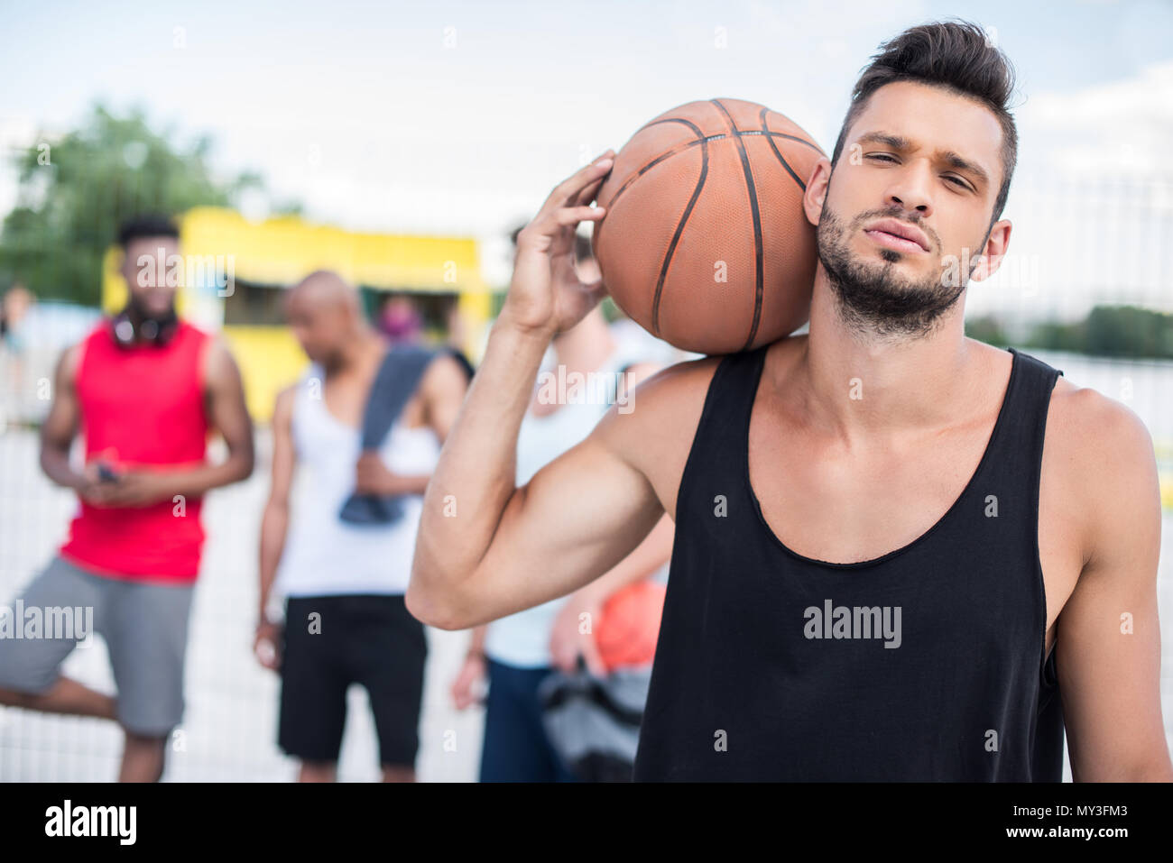 Handsome basketball player hi-res stock photography and images - Alamy