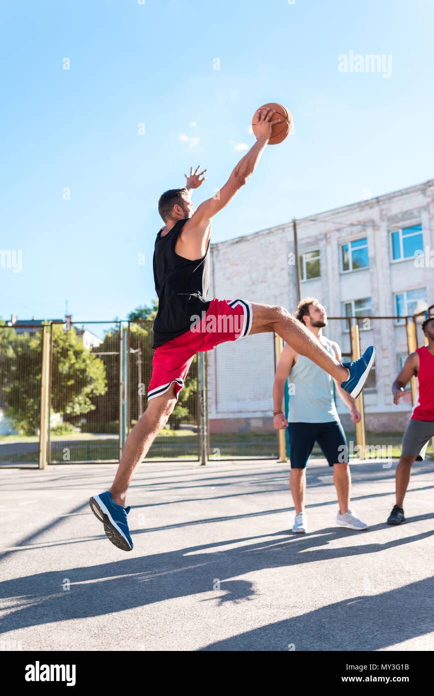 Basketball player catching ball hi-res stock photography and images - Alamy
