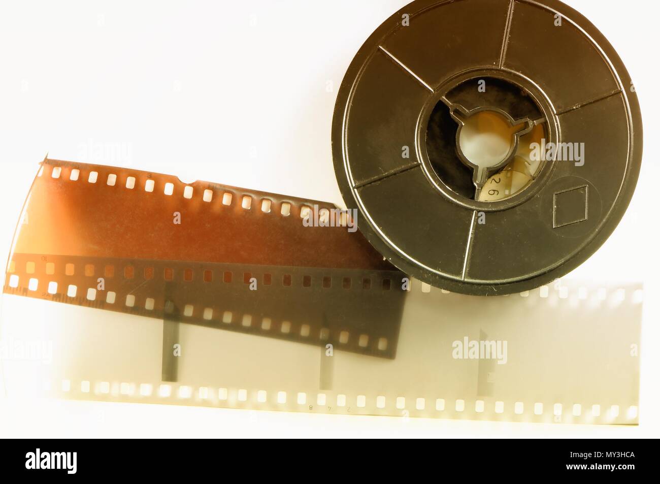 Vintage film strips with coil Stock Photo - Alamy