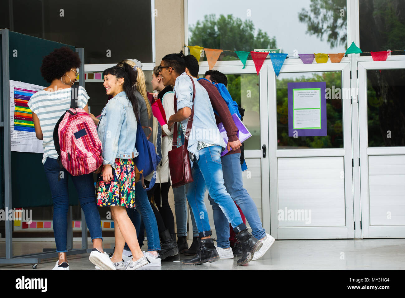 Checking with classmate hi-res stock photography and images - Alamy
